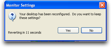 How do I shrink my cursor and icons in Windows XP?