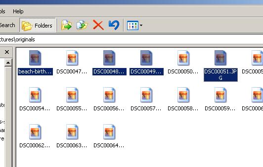 How can I select a group of files in Microsoft Windows XP?