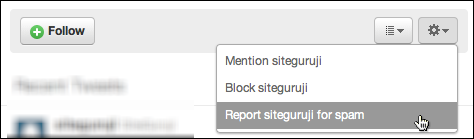How can I report tweet spam replies in Twitter?