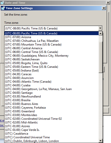 How do I change my Windows Vista PC’s time zone?