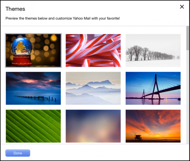 How do I customize my Yahoo Mail with a theme?
