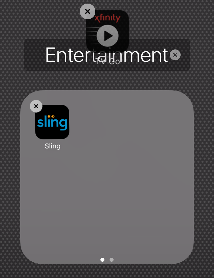 How do I use folders to organize my iPhone apps?
