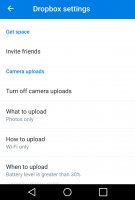 How to have DropBox auto-upload photos on my phone?